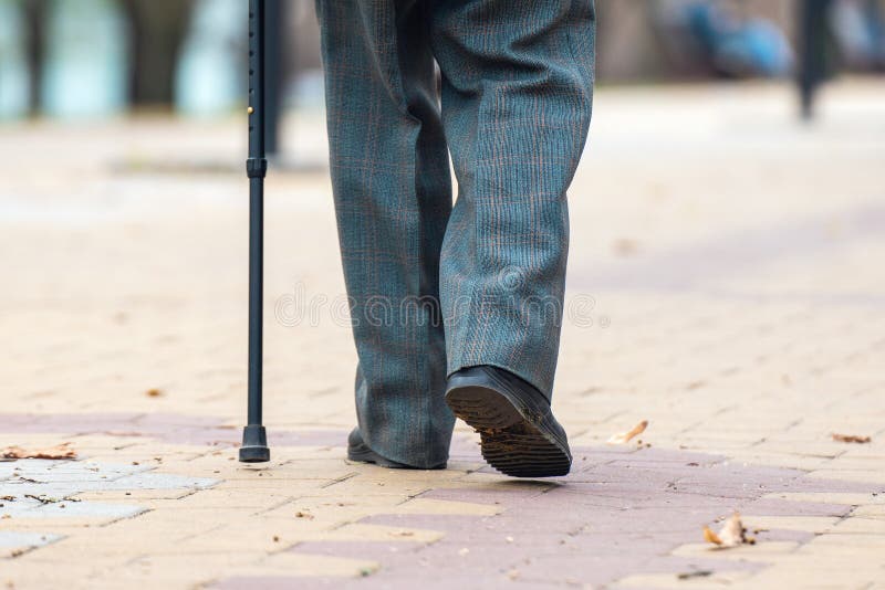 Legs of an Elderly Man Walking with a Cane on the Street Stock Photo ...