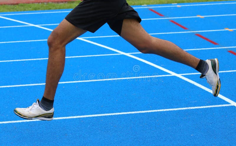 Fast Runner Runs on a Paved Street of the City Stock Photo - Image of ...