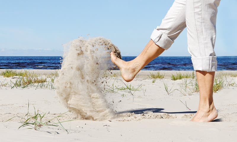 Legs kick sand. stock photo. Image of caucasian, water - 22749846