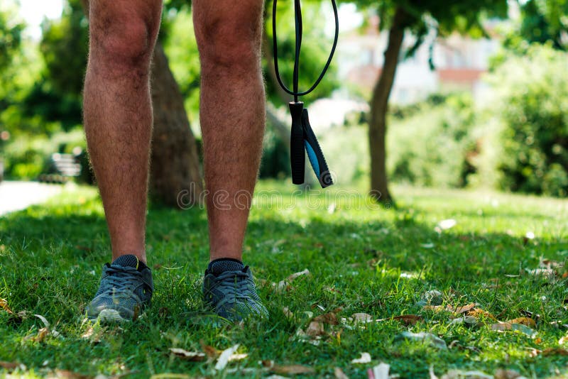 Legs of a Man with Jump Rope Stock Image - Image of park, lifestyle ...
