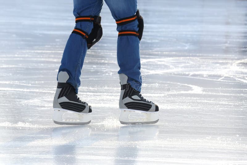 Legs of a Man Skating on the Ice Rink Stock Photo - Image of holiday ...