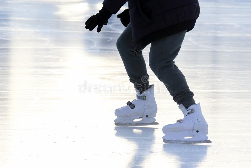 Legs of a Man Skating on the Ice Rink Stock Photo - Image of human ...