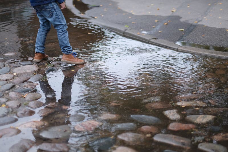 Jump over the puddle stock photo. Image of pool, beautiful - 6329900