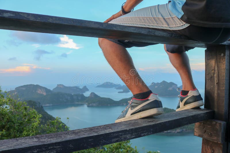 Legs of the Man on the Viewpoint of Archipelago Island. Stock Photo ...