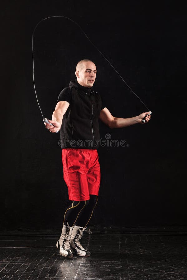 The Legs of Muscular Man with Skipping Rope Stock Photo - Image of ...
