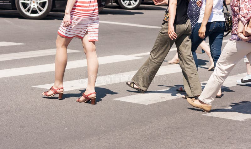 Legs of Pedestrians Crossing the Road Stock Photo - Image of motion ...