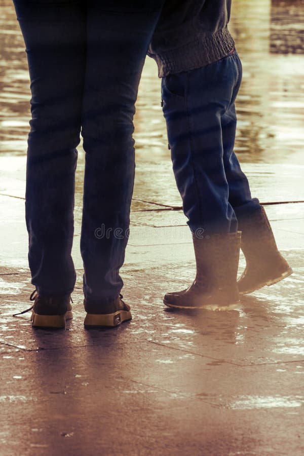Legs of People Standing in the Rain in Bad Autumn Weather Editorial ...