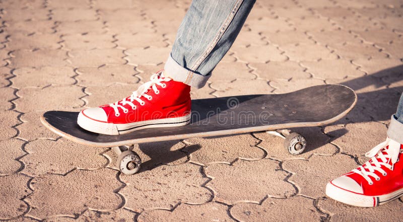 Legs in Red Sneakers on a Skateboard. Stock Image - Image of shoes ...