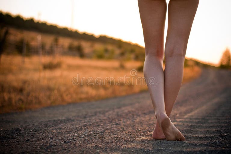 Legs on rural road stock image. Image of leisure, path - 13839651