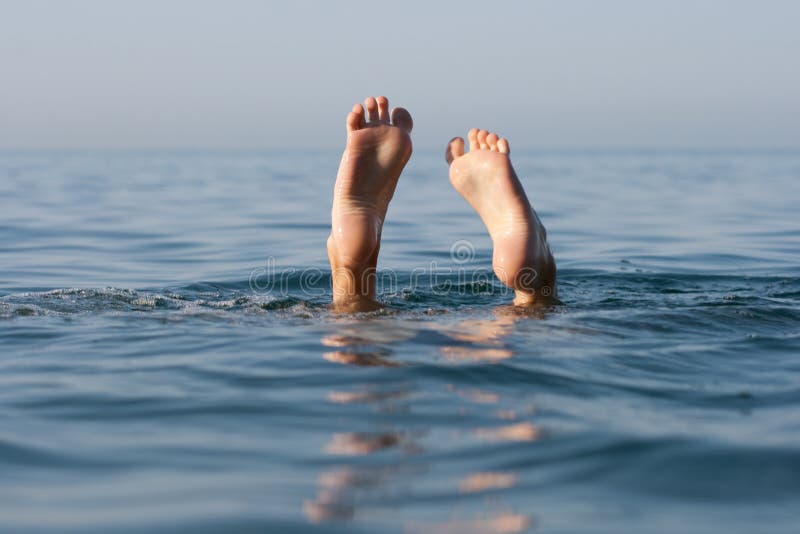 Legs on Sea Water Still Surface Stock Photo - Image of legs, dive: 16134396