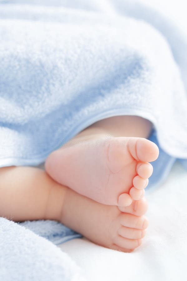 Legs of the small baby stock photo. Image of oversleep - 14862888