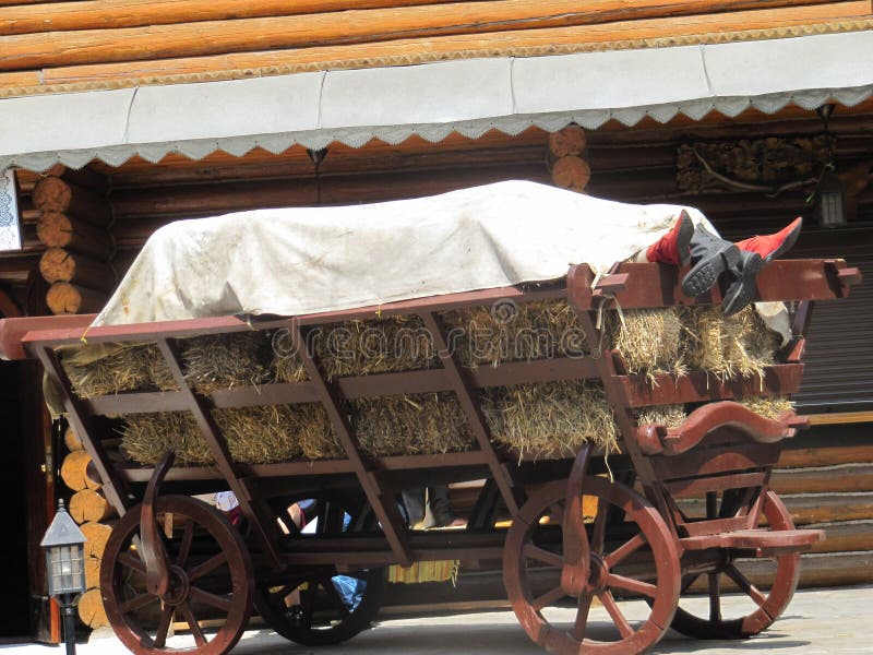 Legs Stick Out of the Hayloft Stock Image - Image of people, carving ...