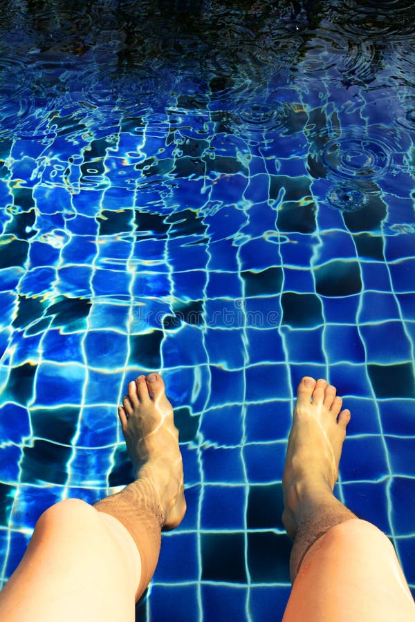 Legs in the Swimming Pool with Blue Tiles Stock Image - Image of ...