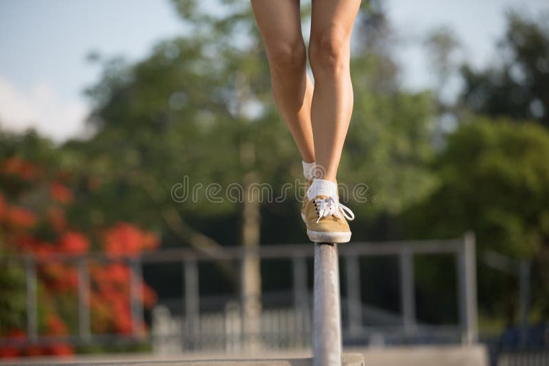 Legs walking on steel pipe stock image. Image of person - 117757715