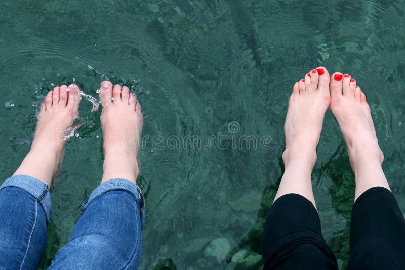 Legs in the Water Making Splashes Stock Photo - Image of swim, relax ...