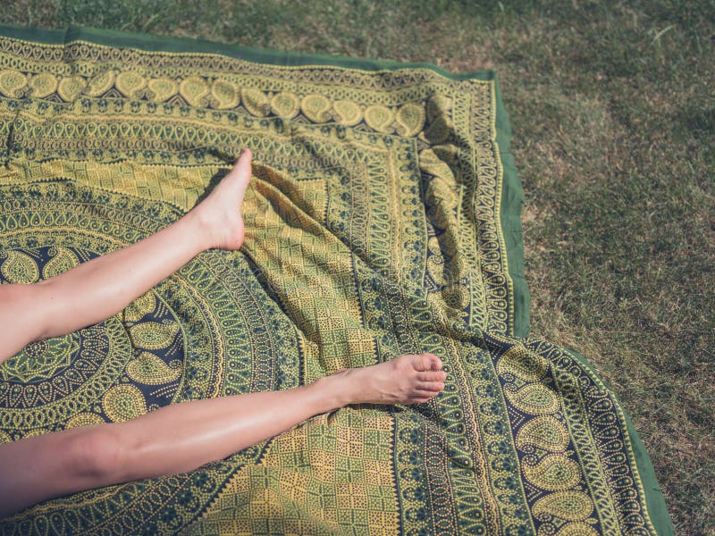 Legs of Young Woman Relaxing Outside on Grass Stock Image - Image of ...