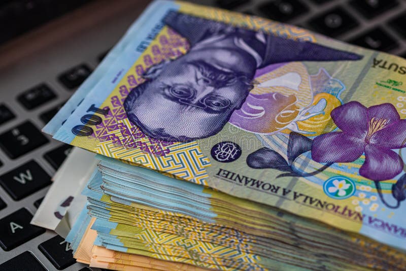 Lei Banknotes on Keyboard. Selective Focus on Stack of LEI Romanian ...