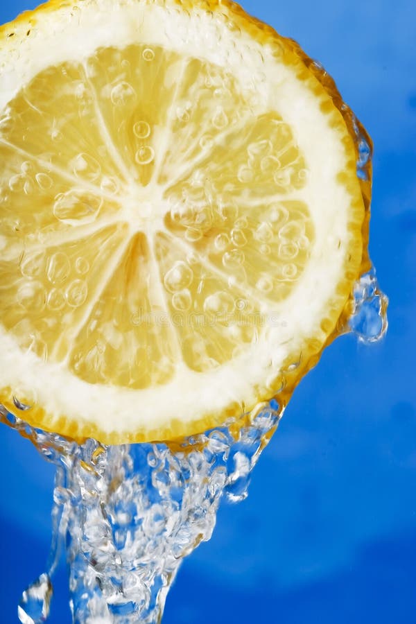 Fresh lemon stock image. Image of pour, drink, coctail, slice - 7441