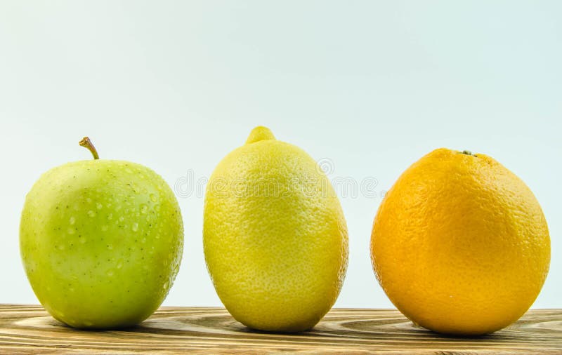 Lemon, Apple, Orange on a White Background Stock Photo - Image of ...