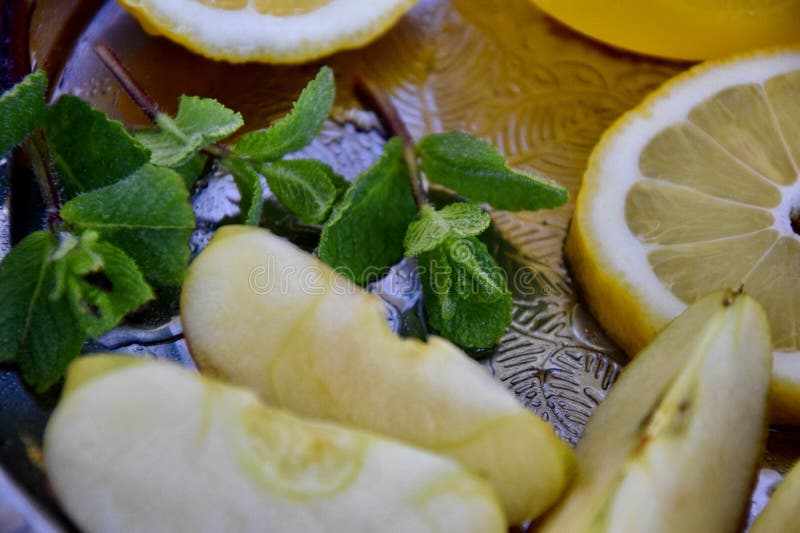 Lemon and Apple Slices with a Fresh Mint Stock Photo - Image of ...