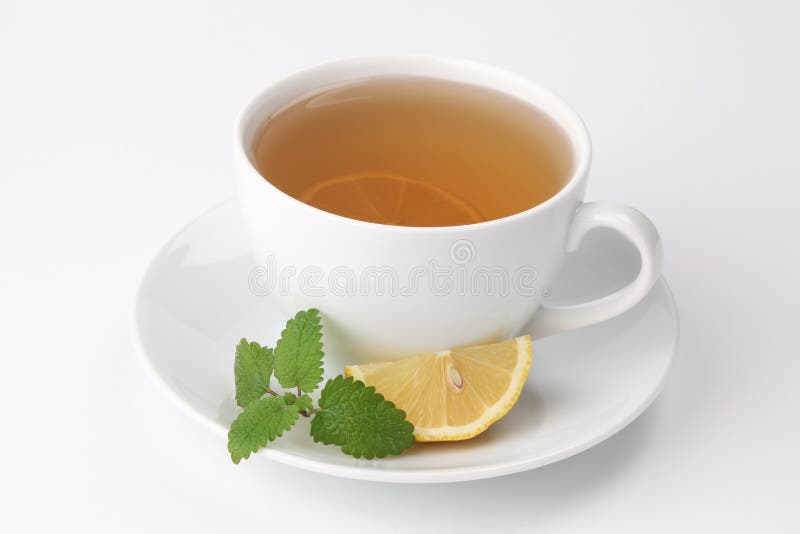 Lemon balm tea with lemon stock image. Image of organic - 16512905