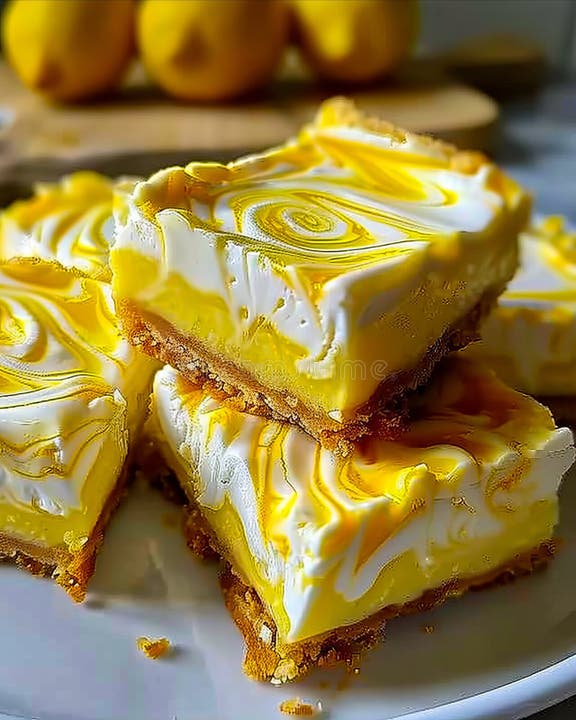 Lemon Bars with a White Swirl on Top Stock Photo - Image of swirl ...