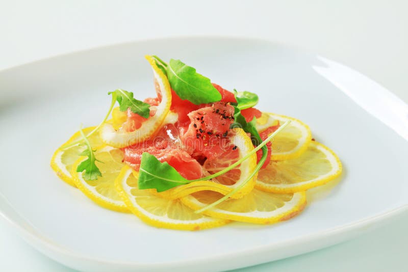 Lemon and beef Carpaccio stock photo. Image of cuisine - 55803284
