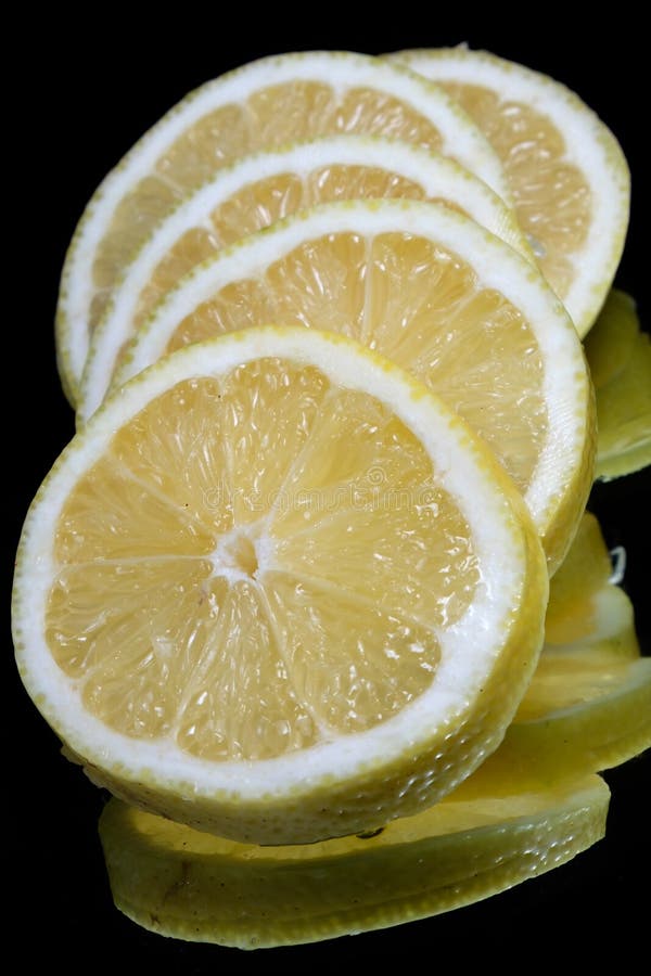 Lemon on a Black Background Stock Photo - Image of ripe, juicy: 61210712