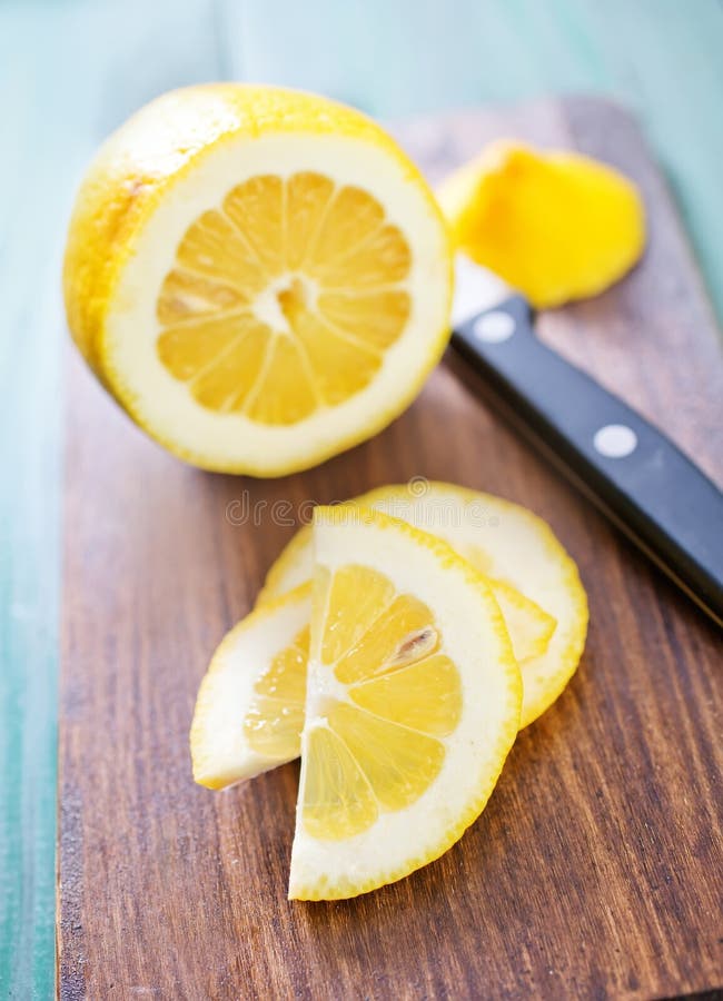 Lemon on board stock photo. Image of table, ripe, slice - 40511018