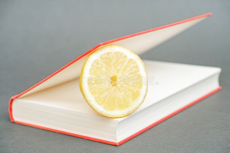 Lemon in a book stock photo. Image of lemons, space, abstract - 68232996