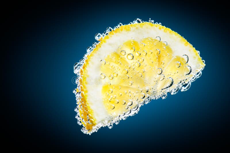 Lemon with Bubbles in a Blue Gradient Background. Stock Photo - Image ...