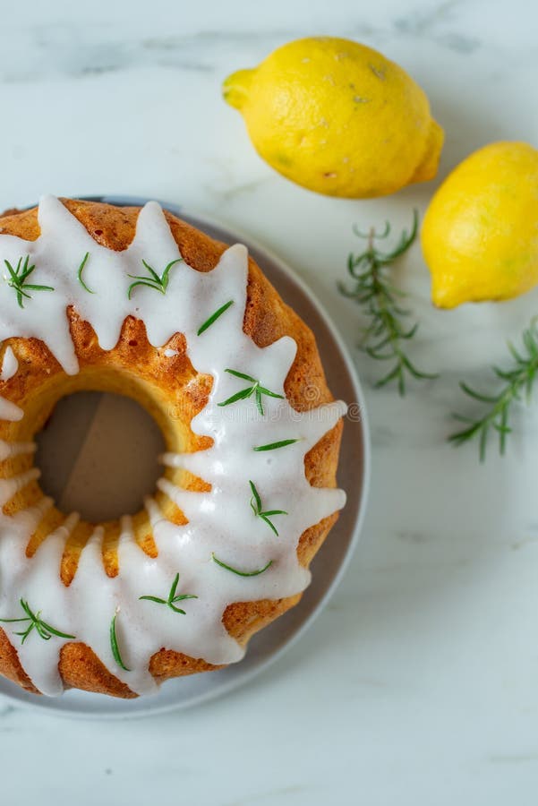 Lemon Bundt Cake Drizzled with Powdered Sugar Glaze Stock Image - Image ...