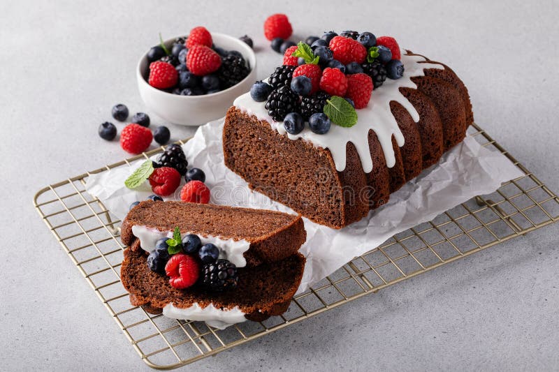 Lemon Bundt Cake on a Cake Stand with Powdered Sugar Glaze Stock Photo ...