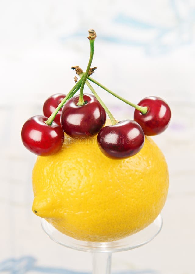 Lemon and cherry. stock photo. Image of garnish, yellow - 31583456