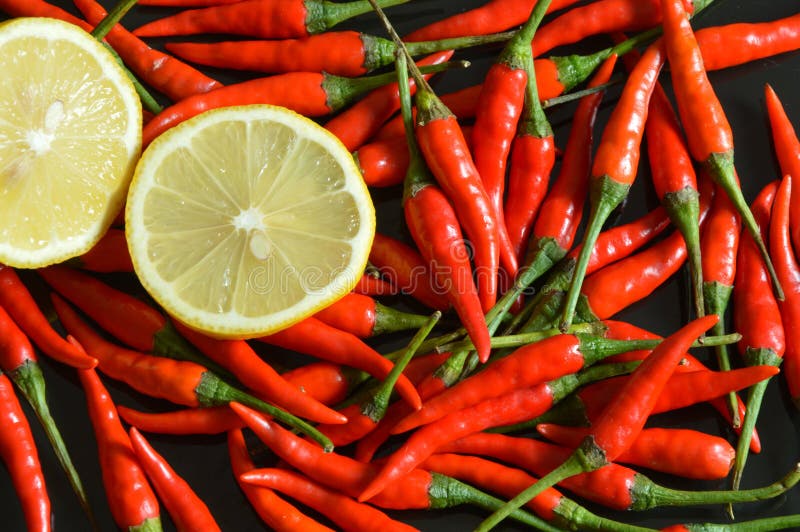 Lemon and chilli close up stock photo. Image of closeup - 68640762