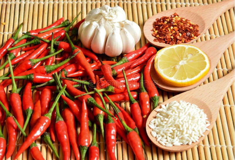 Lemon and chilli close up stock image. Image of wooden - 68641299