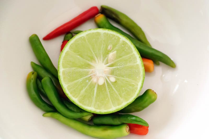 Lemon and chilli stock image. Image of ripe, slice, lemons - 112405209