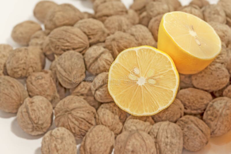 Lemon Close and Walnut on White Table Stock Photo - Image of health ...