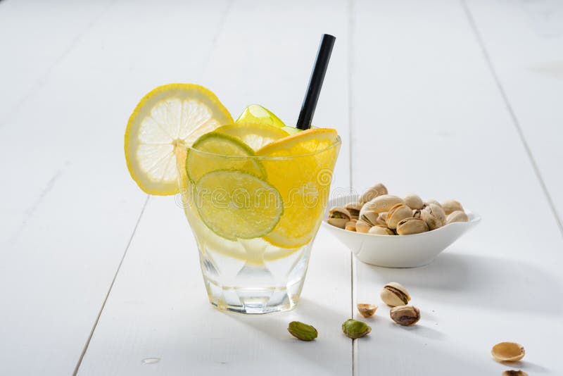 Lemon cocktail with straw stock photo. Image of straw - 57579720
