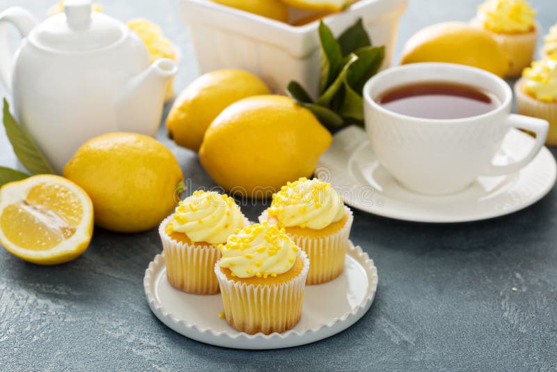 Lemon Cupcakes with Bright Yellow Frosting Stock Photo - Image of fairy ...
