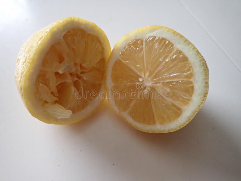 Lemon Cut into Halves on a Table Stock Image - Image of healthy, plants ...