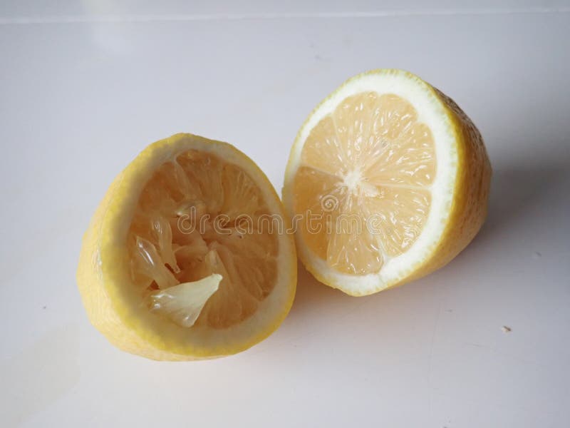 Lemon Cut into Halves on a Table Stock Image - Image of horizontal ...