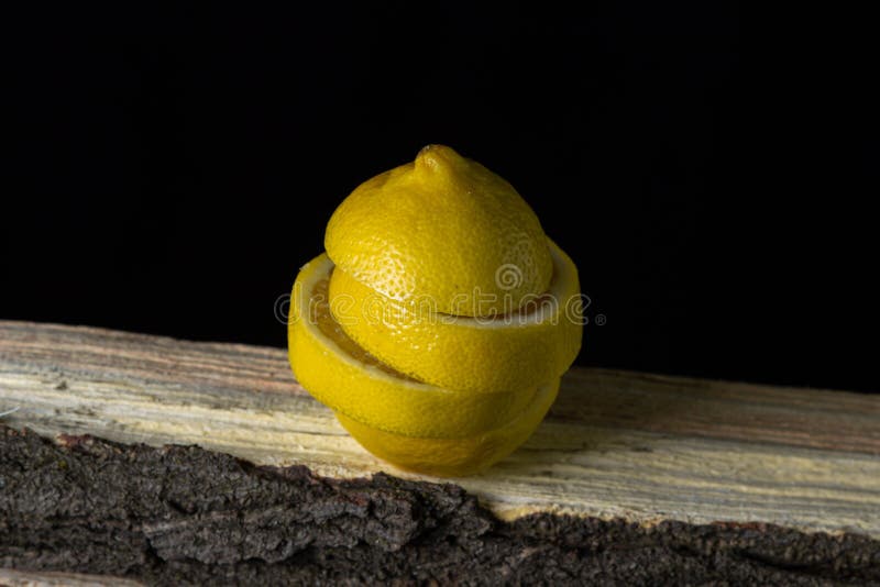 Lemon on a Dark Background. Sliced Lemon on a Black Background Stock ...
