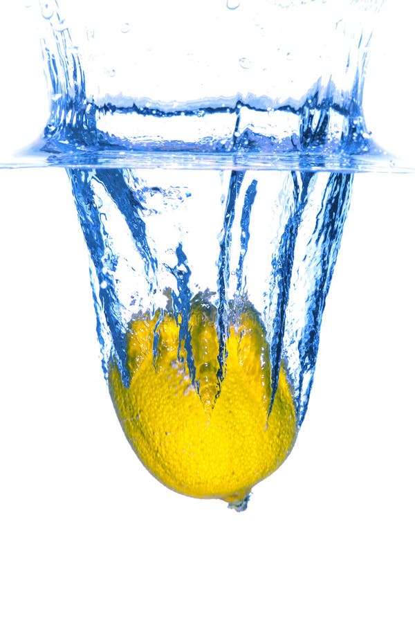 Lemon dropped in water stock photo. Image of water, spatter - 22186858