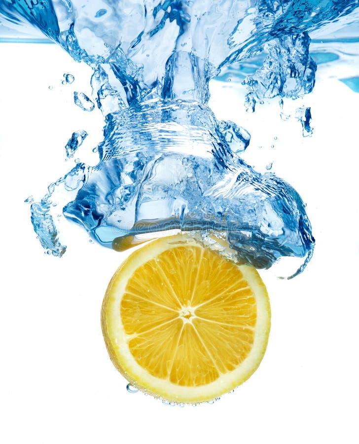 Lemon slice in blue water stock photo. Image of lemon - 17927256