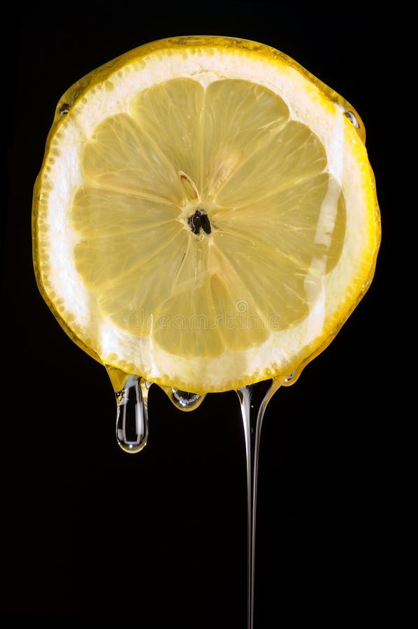 Lemon with drops of juice stock image. Image of drip - 15058759