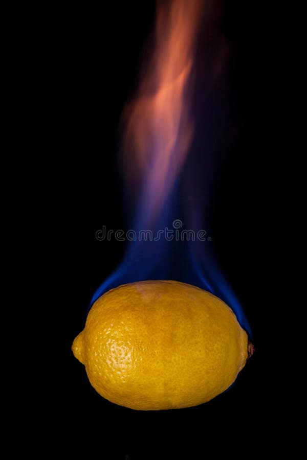 Lemon in a flame of fire stock image. Image of symbol - 29643017