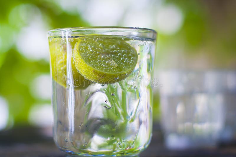 Lemon in the glass stock photo. Image of background, healthy - 72074900