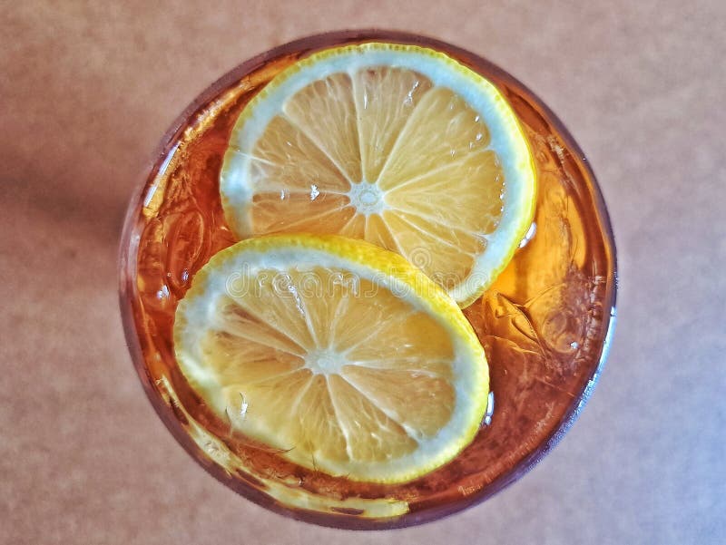 Lemon is in a Glass of Iced Tea Stock Photo - Image of cocktail ...