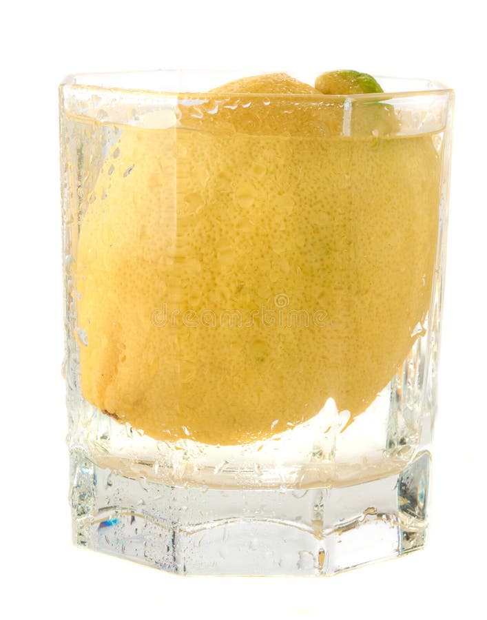 Lemon in glass with water stock photo. Image of large - 12298838